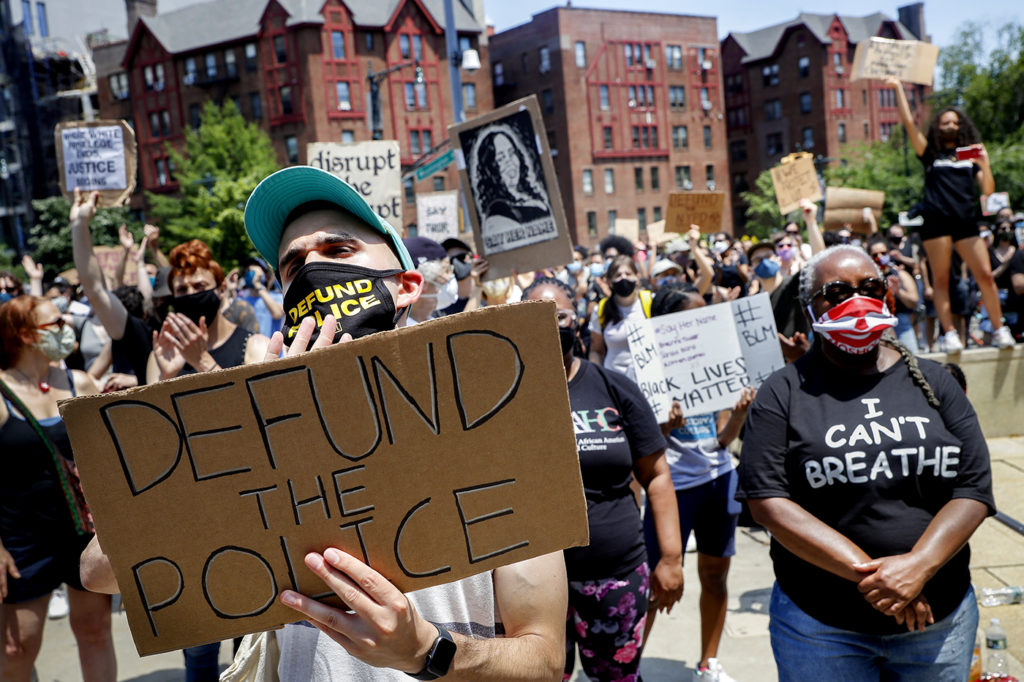 What would it mean to ‘defund’ the police–and what would come next ...